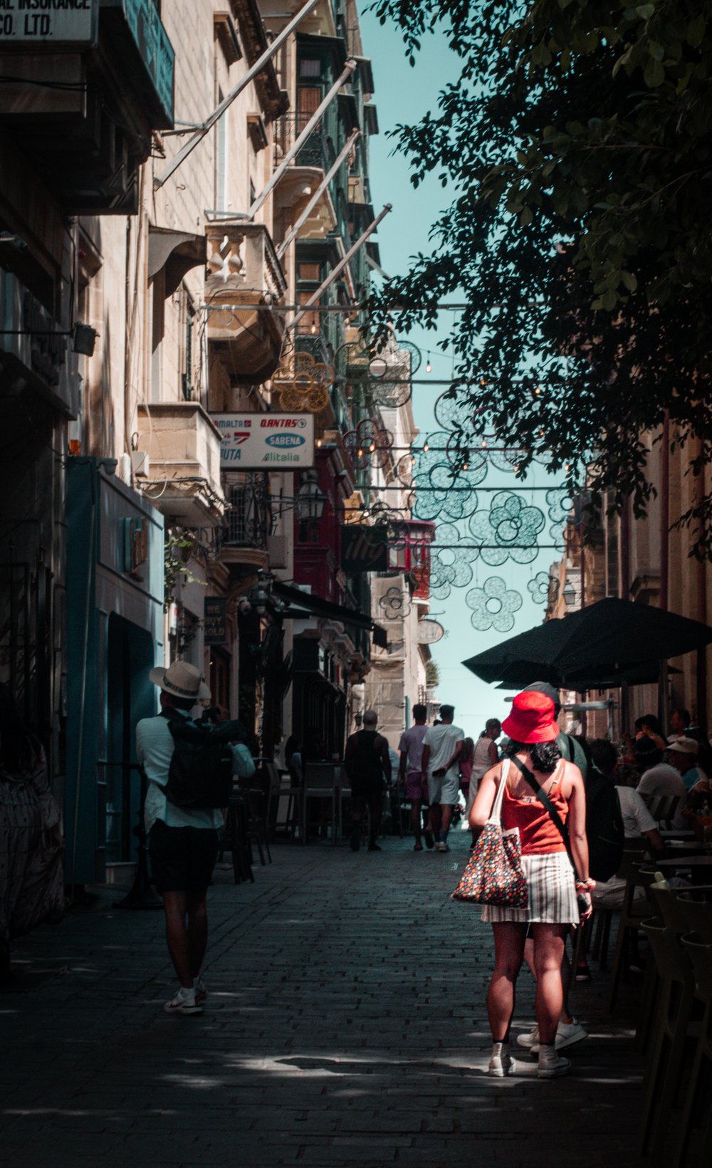 Red Hat in a patch of light | helloart